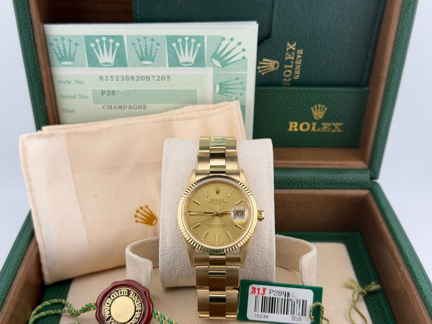 Rolex Date 15238 34mm Champagne Dial 18k Yellow Gold Oyster Box Paper